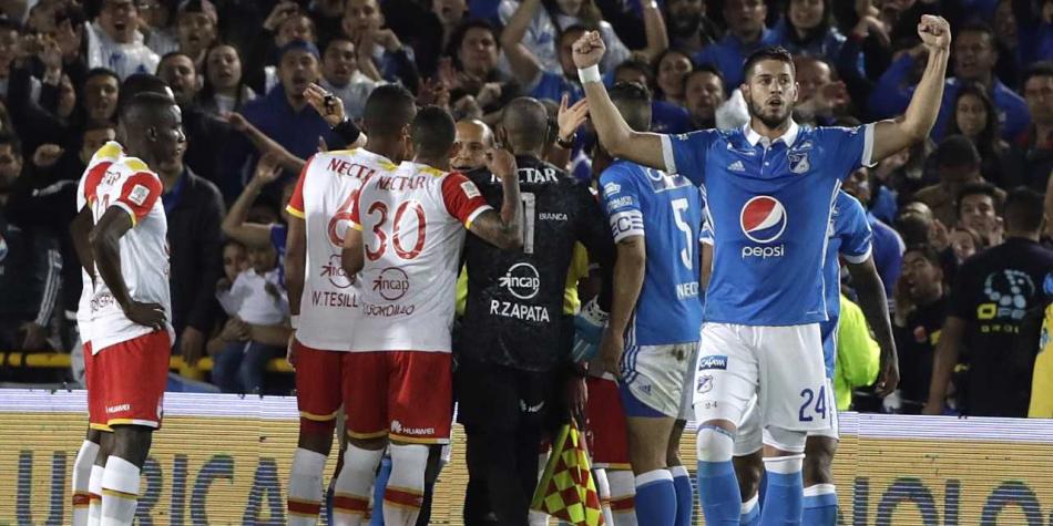GANÓ DE LA MANO DE LOS SANTOS - Q'hubo